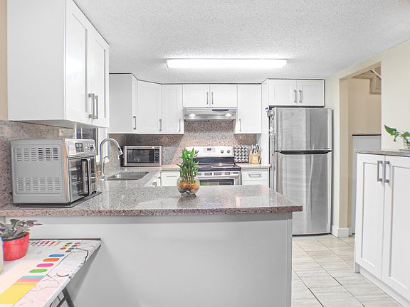 7150 133rd St #208, Surrey, BC V3W 7Z7 | MLS #R2830459 | Zillow