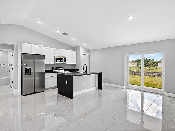 702 Carbon St, Lehigh Acres, FL 33974 | MLS #A12043307 | Zillow