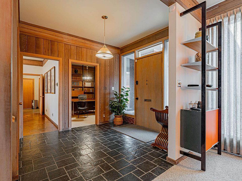 Check out the foyer! Beautiful wood detail! C. 1963 in Illinois ...