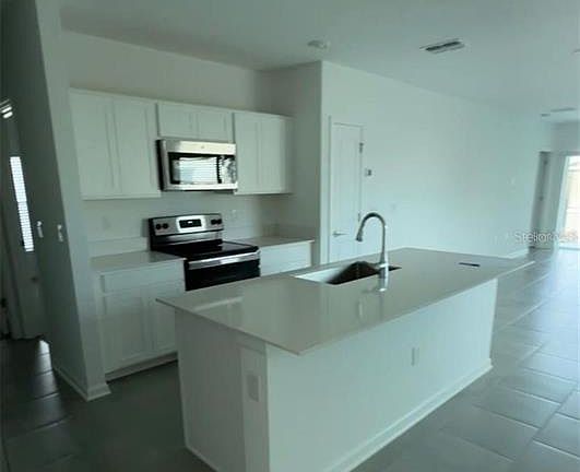 2002 Punch Bowl Ave, Davenport, FL 33837 | MLS #O6404477 | Zillow
