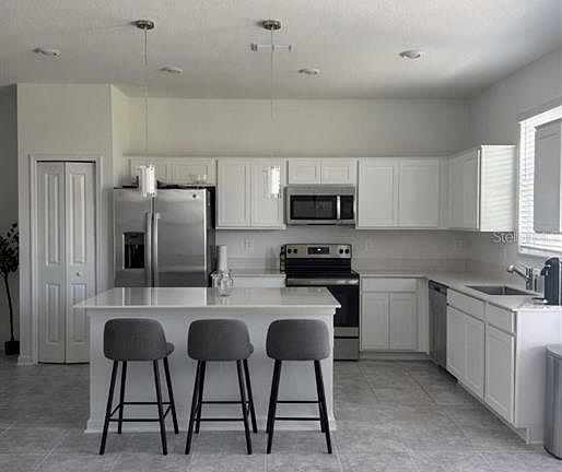 337 Bogey Dr, Davenport, FL 33896 | MLS #TB8458572 | Zillow